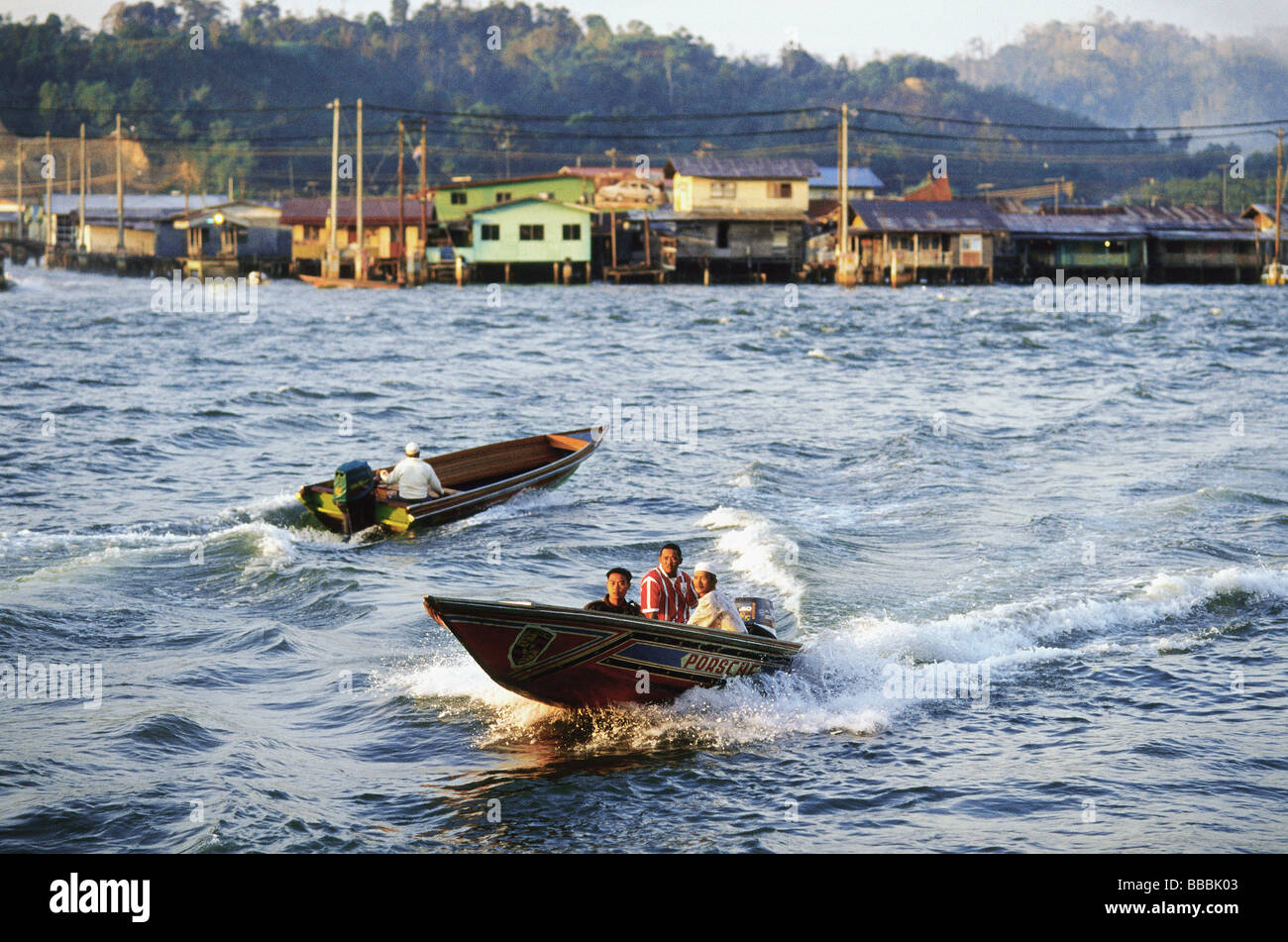 Brunei, fast water taxies shuttle between Kampong Ayer and Bandar Seri ...