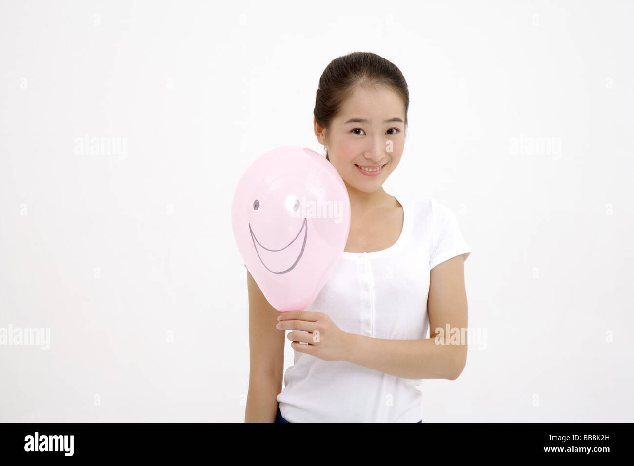 Balloon with smile drawn on hi-res stock photography and images - Alamy