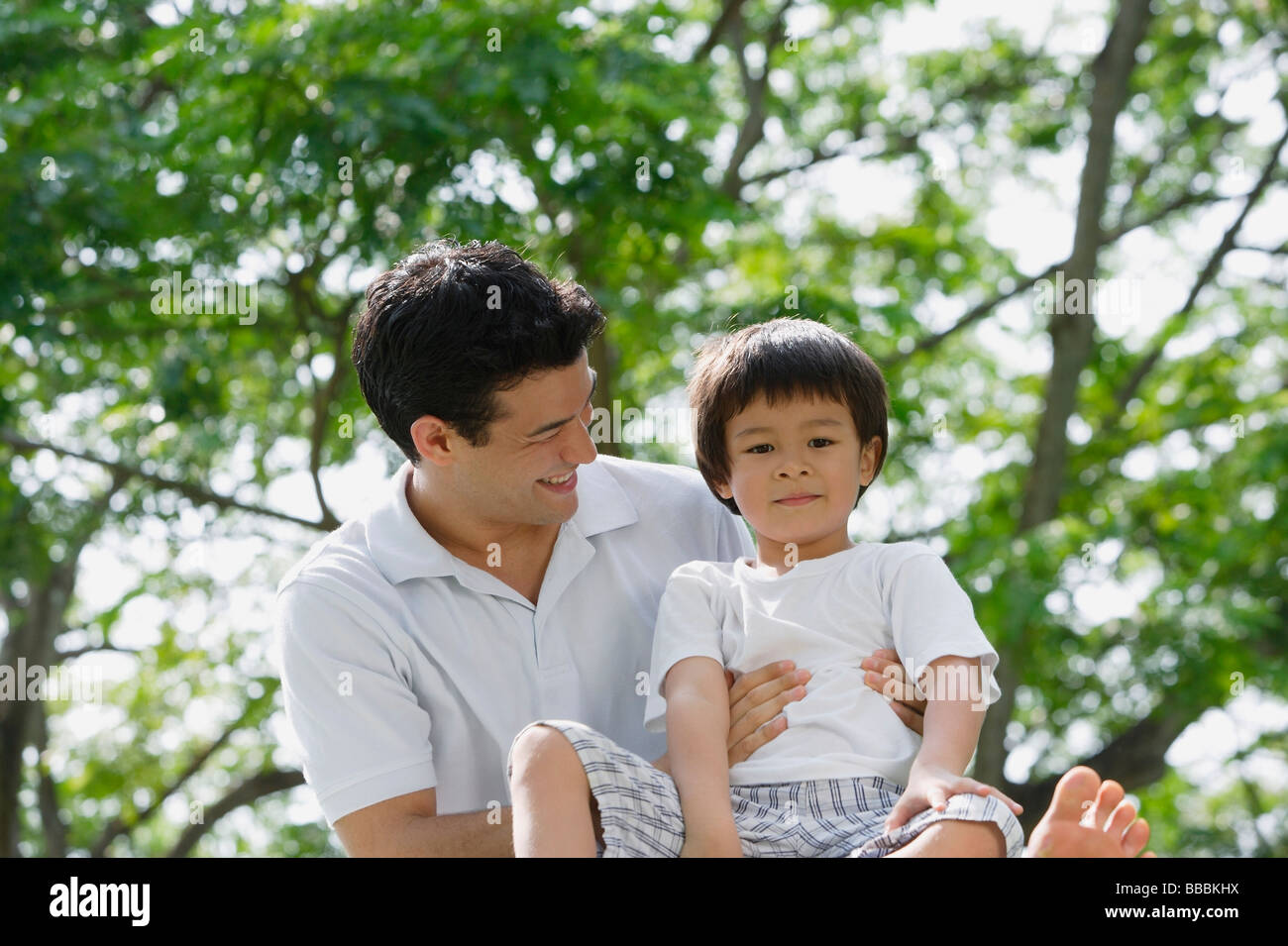 Father and son at the park Stock Photo - Alamy