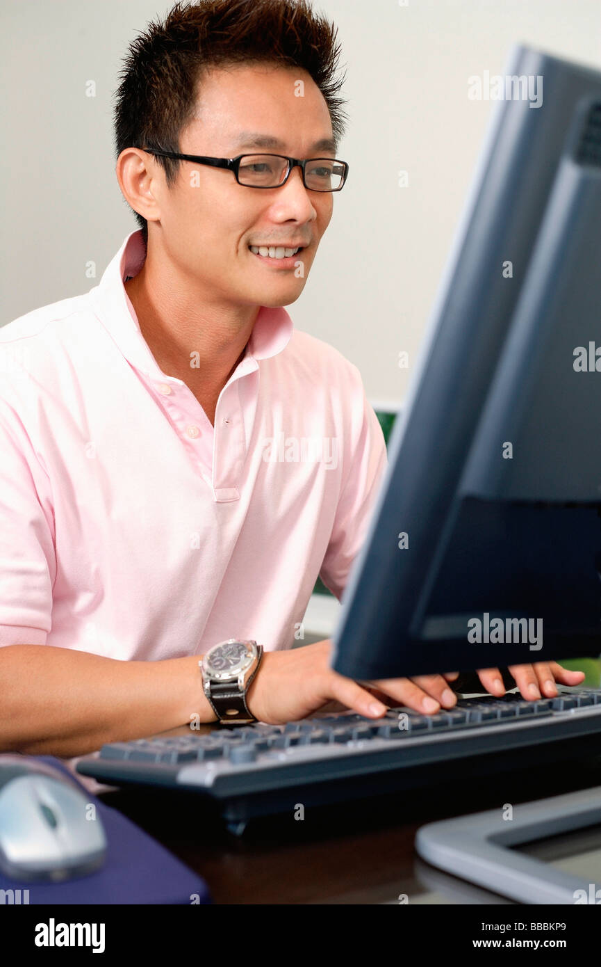 Man using computer Stock Photo - Alamy