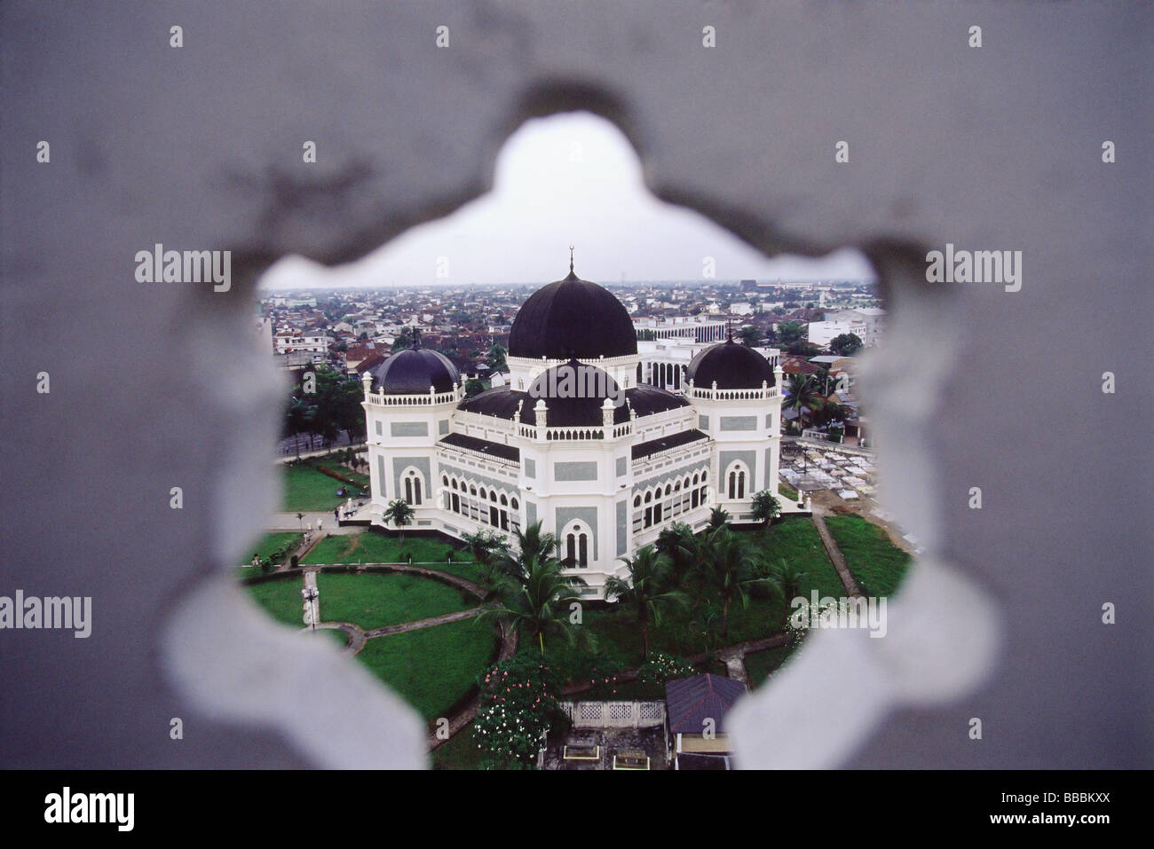 Indonesia, Sumatra, Mosque in Medan, city in background Stock Photo - Alamy