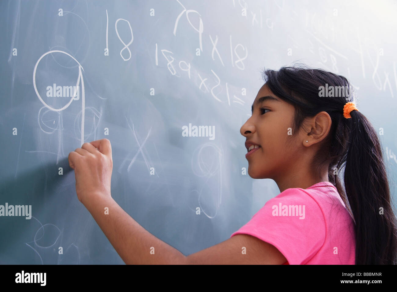 girl at chalkboard (side view Stock Photo - Alamy