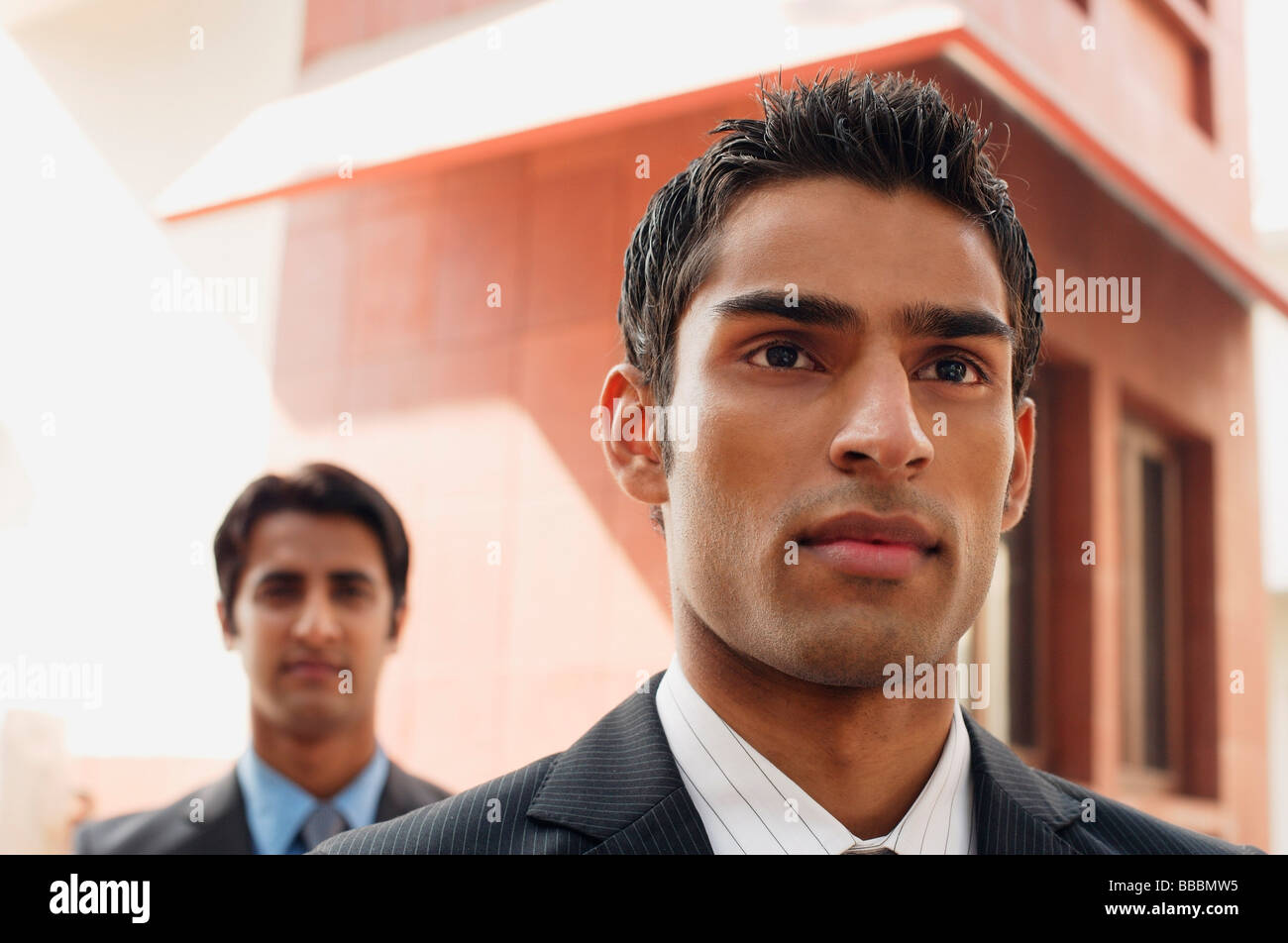 two business men, facing camera (close up Stock Photo - Alamy