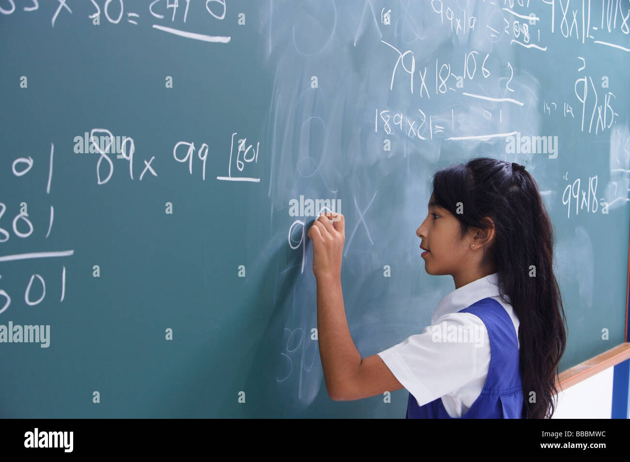 girl working at chalkboard (horizontal Stock Photo - Alamy