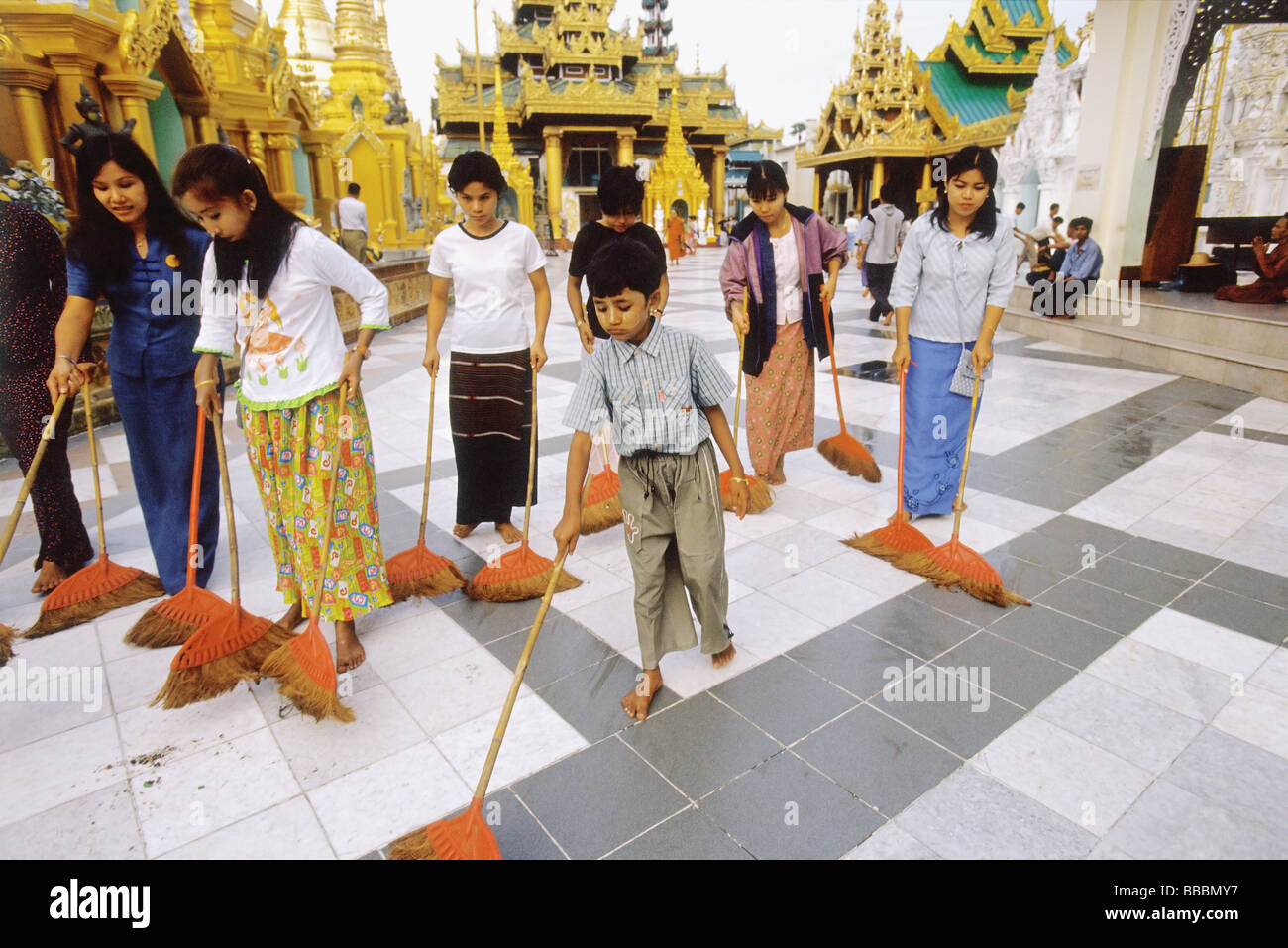 Myanmar (Burma), Yangon (Rangoon), Group of young adults and children ...