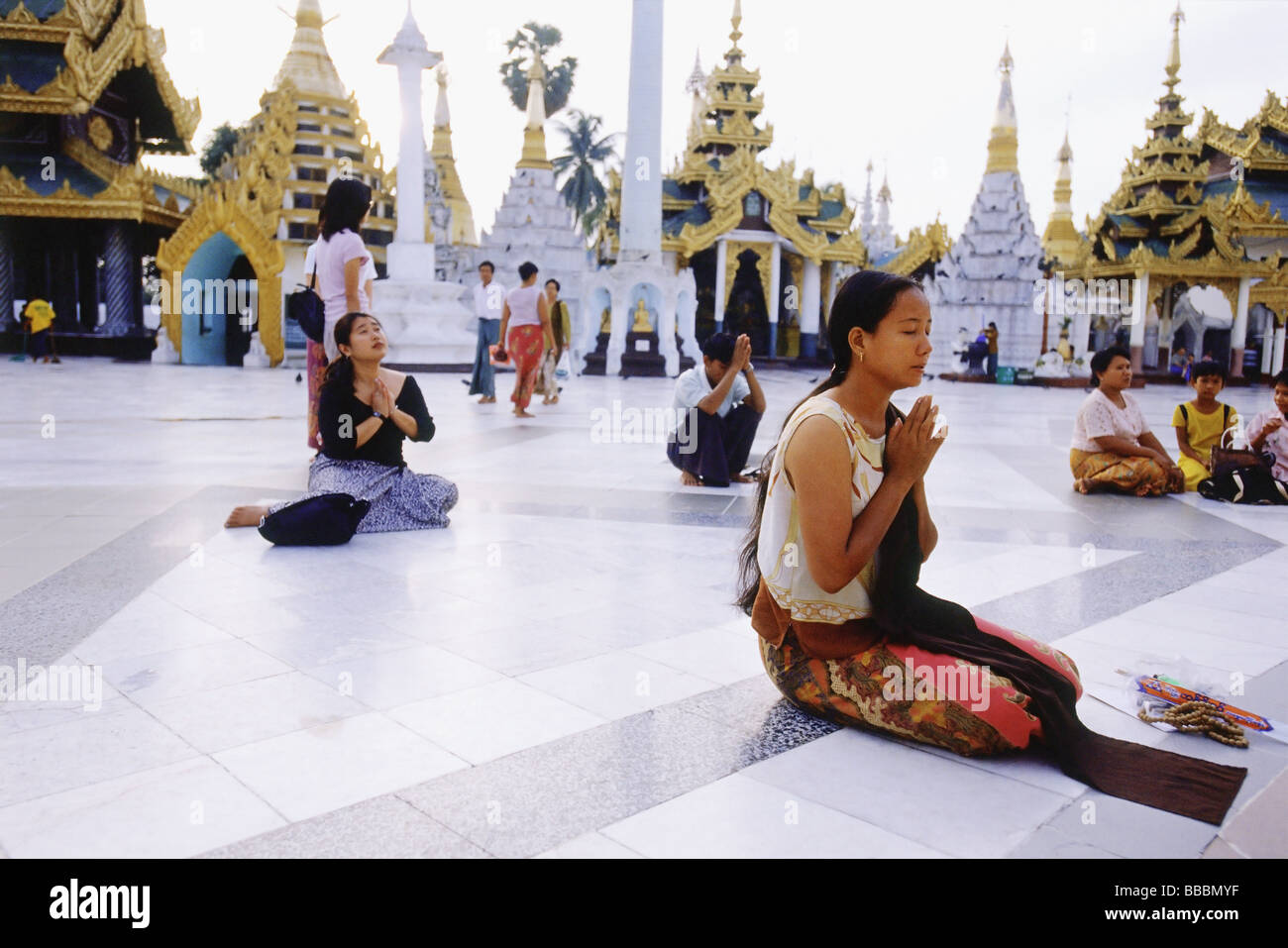 Myanmar (Burma), Yangon (Rangoon), People praying at the Shwedagon ...