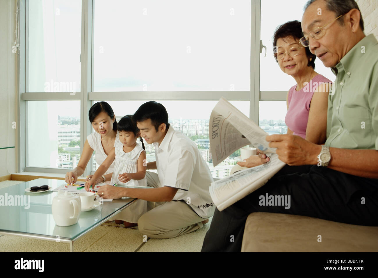 Three generation family in living room Stock Photo - Alamy