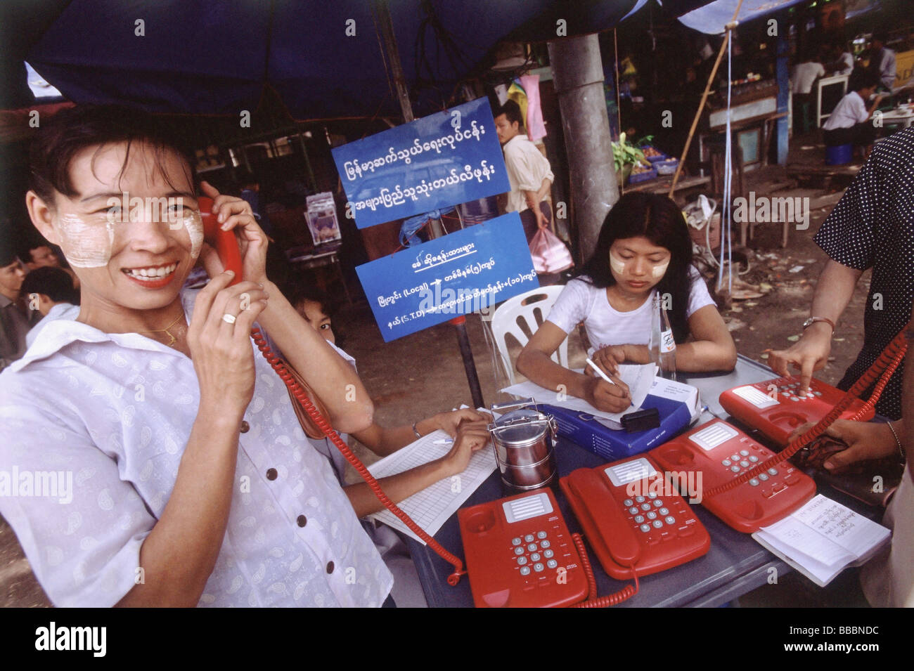 Myanmar (Burma), Yangon (Rangoon), A woman wearing homemade makeup ...