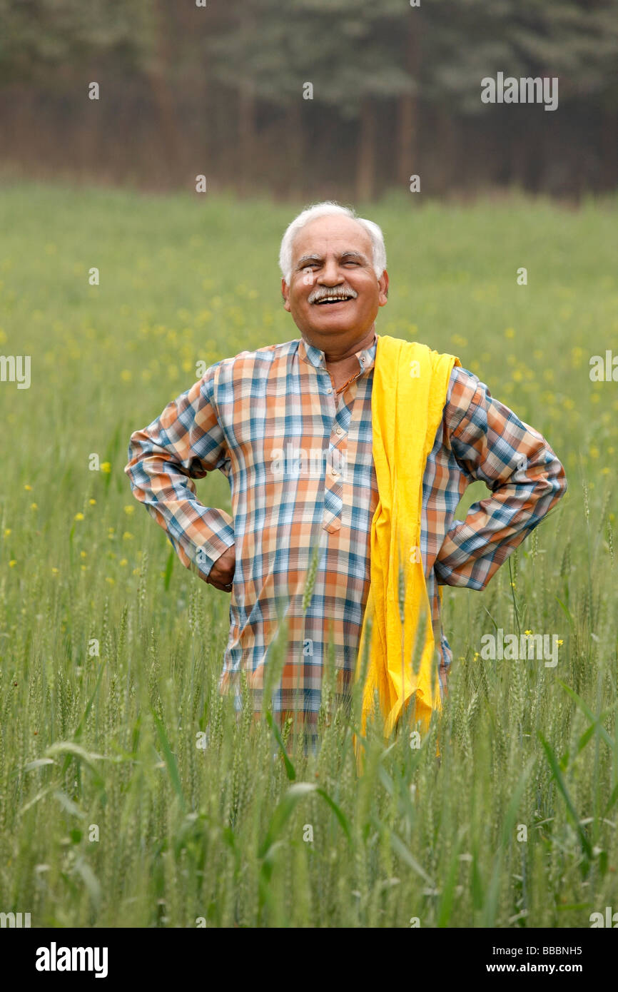Farmer in field Stock Photo - Alamy