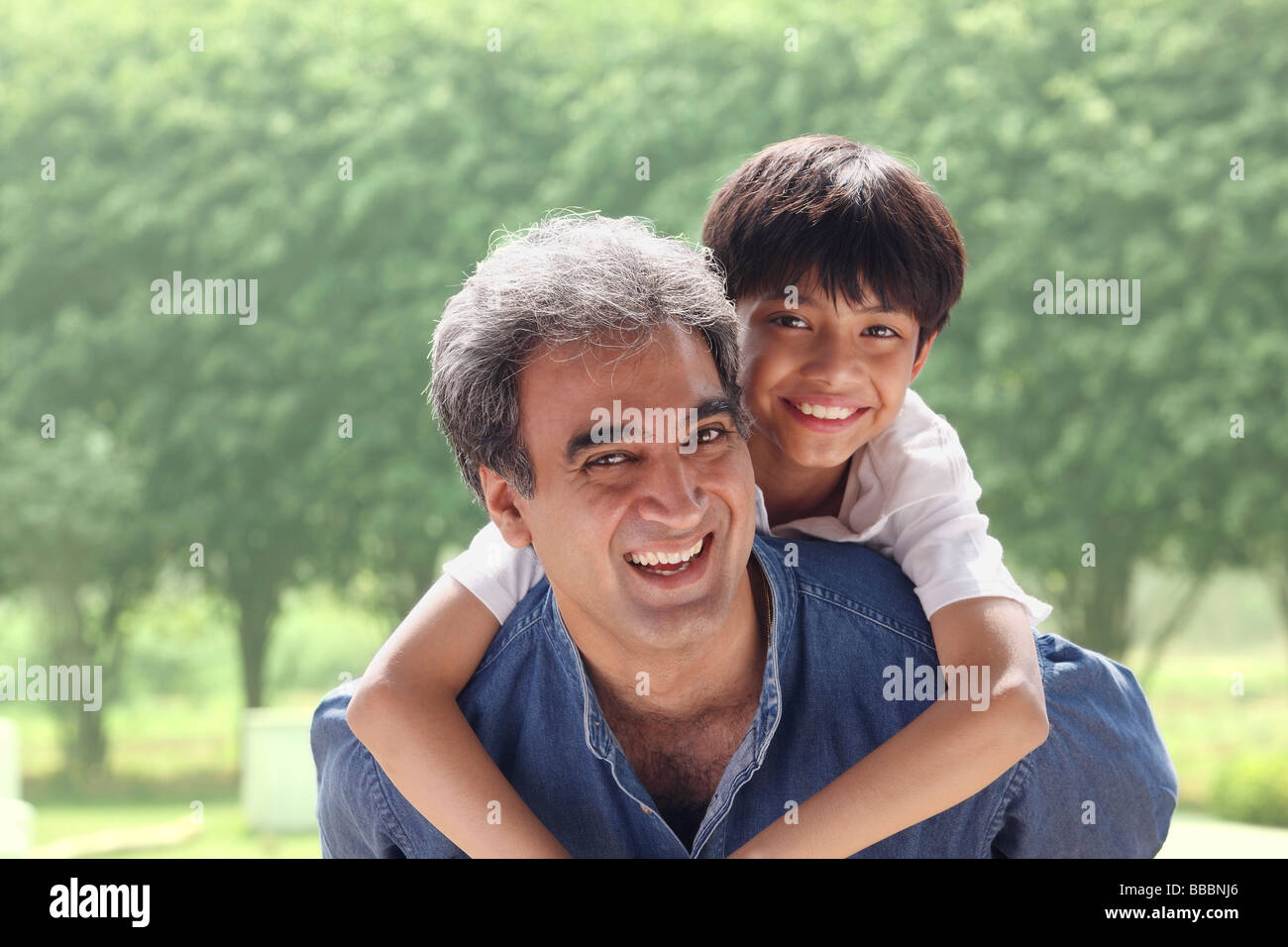 Indian father son back hi-res stock photography and images - Alamy