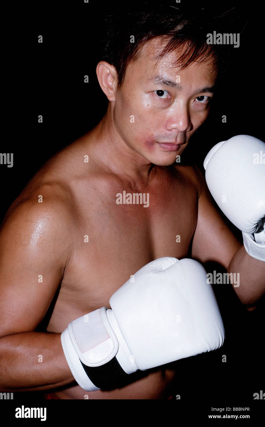 Male boxer looking at camera Stock Photo - Alamy