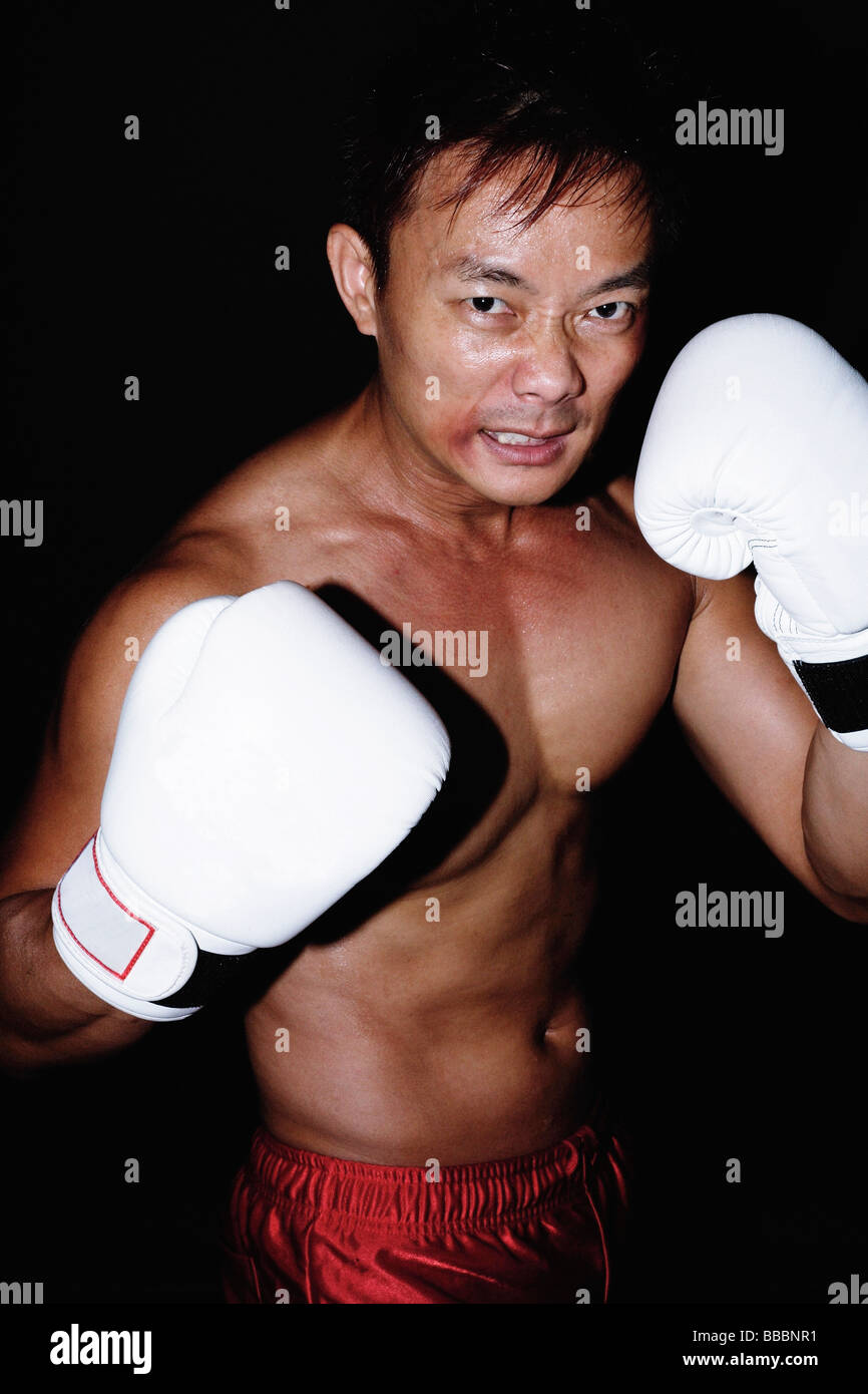 Male boxer with boxing gloves Stock Photo - Alamy