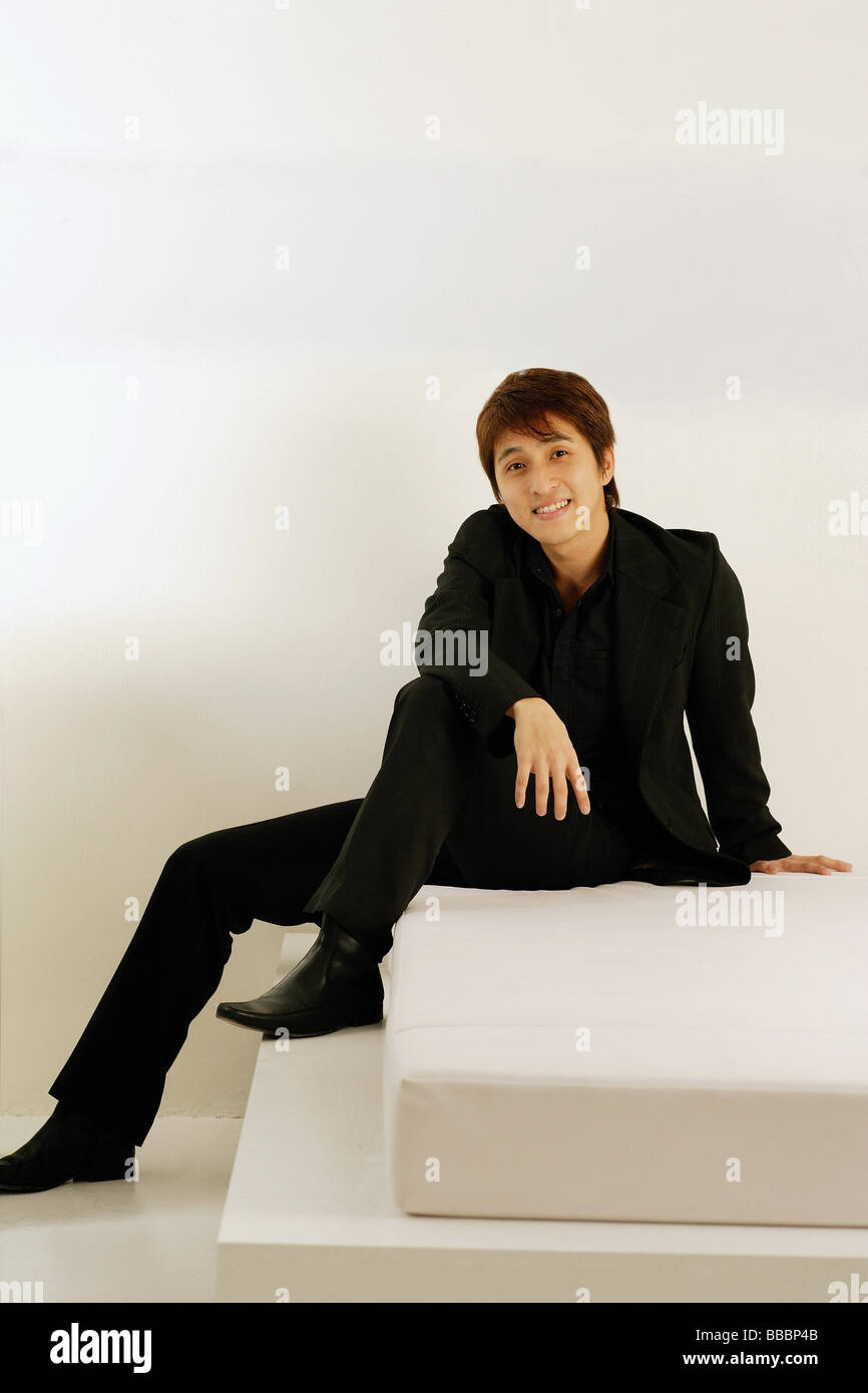 Man sitting down black and white hi-res stock photography and images ...