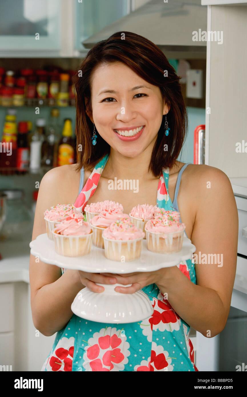 One woman tray cakes hi-res stock photography and images - Alamy