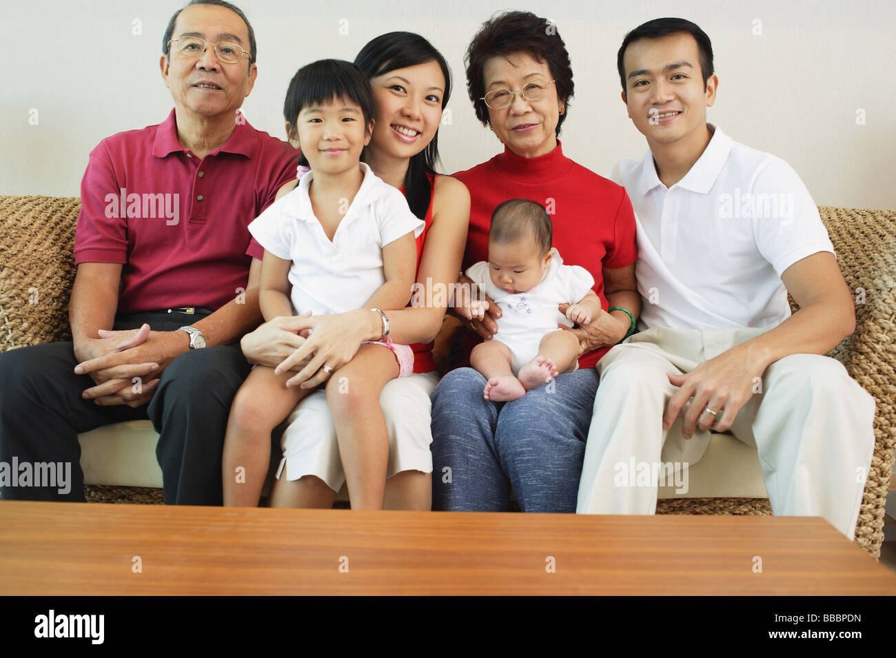 Three generation family, looking at camera, portrait Stock Photo - Alamy