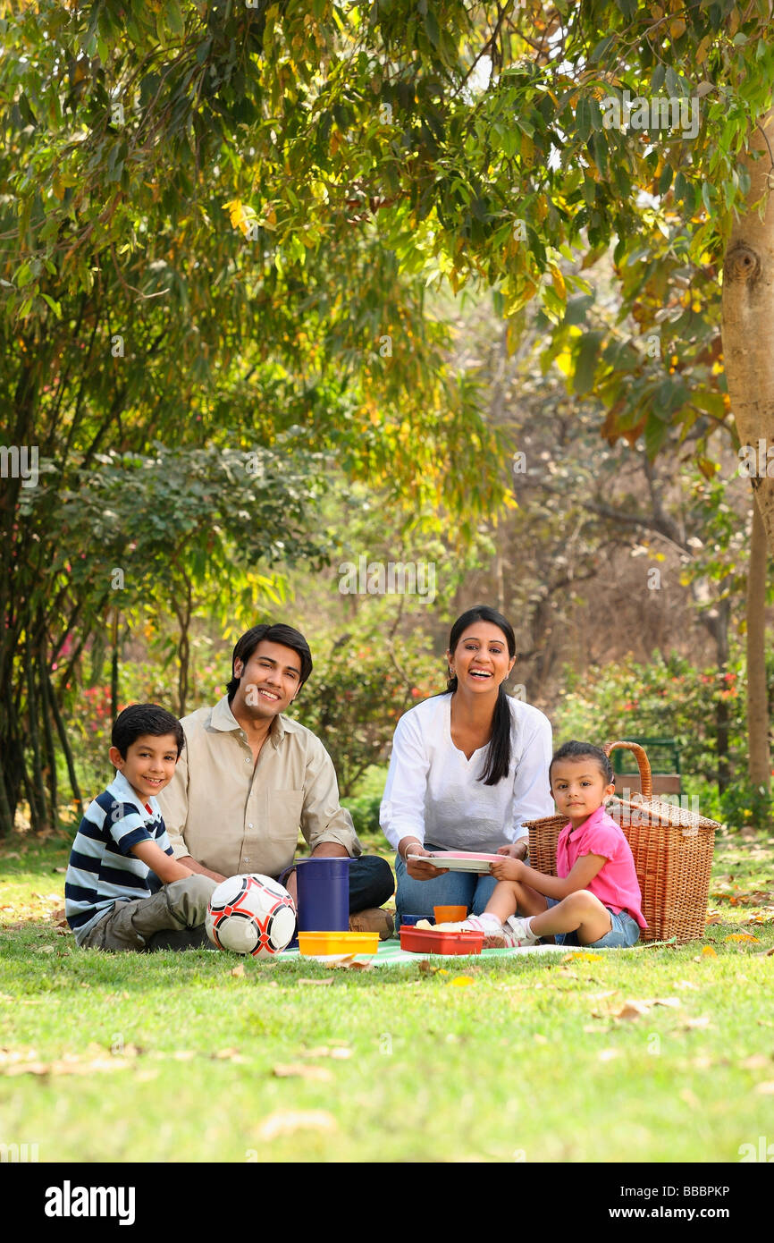 Family picnic in park Stock Photo - Alamy