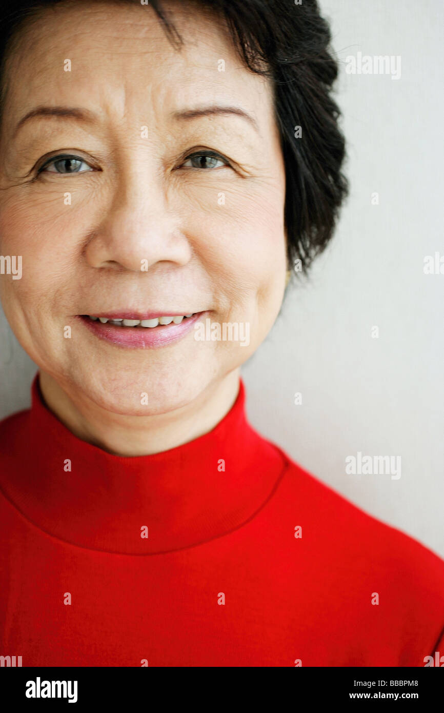Smiling mature woman looking camera hi-res stock photography and images ...