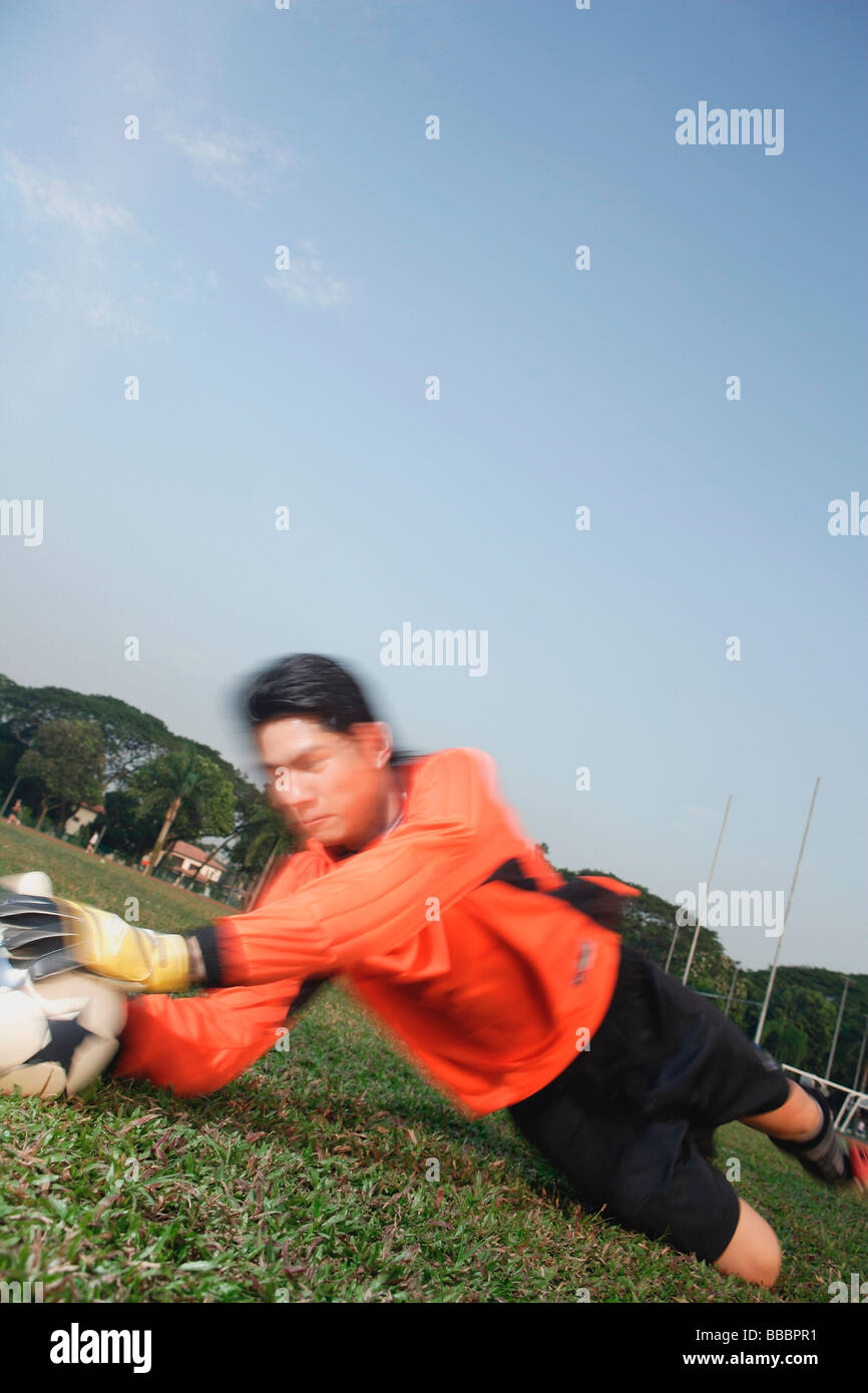 Dive for ball hi-res stock photography and images - Alamy