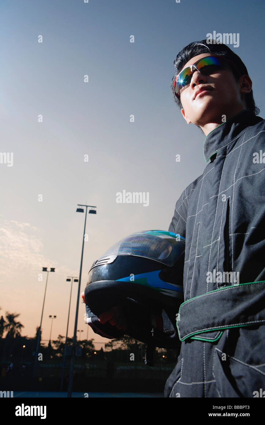 Race car driver holding helmet hi-res stock photography and images - Alamy
