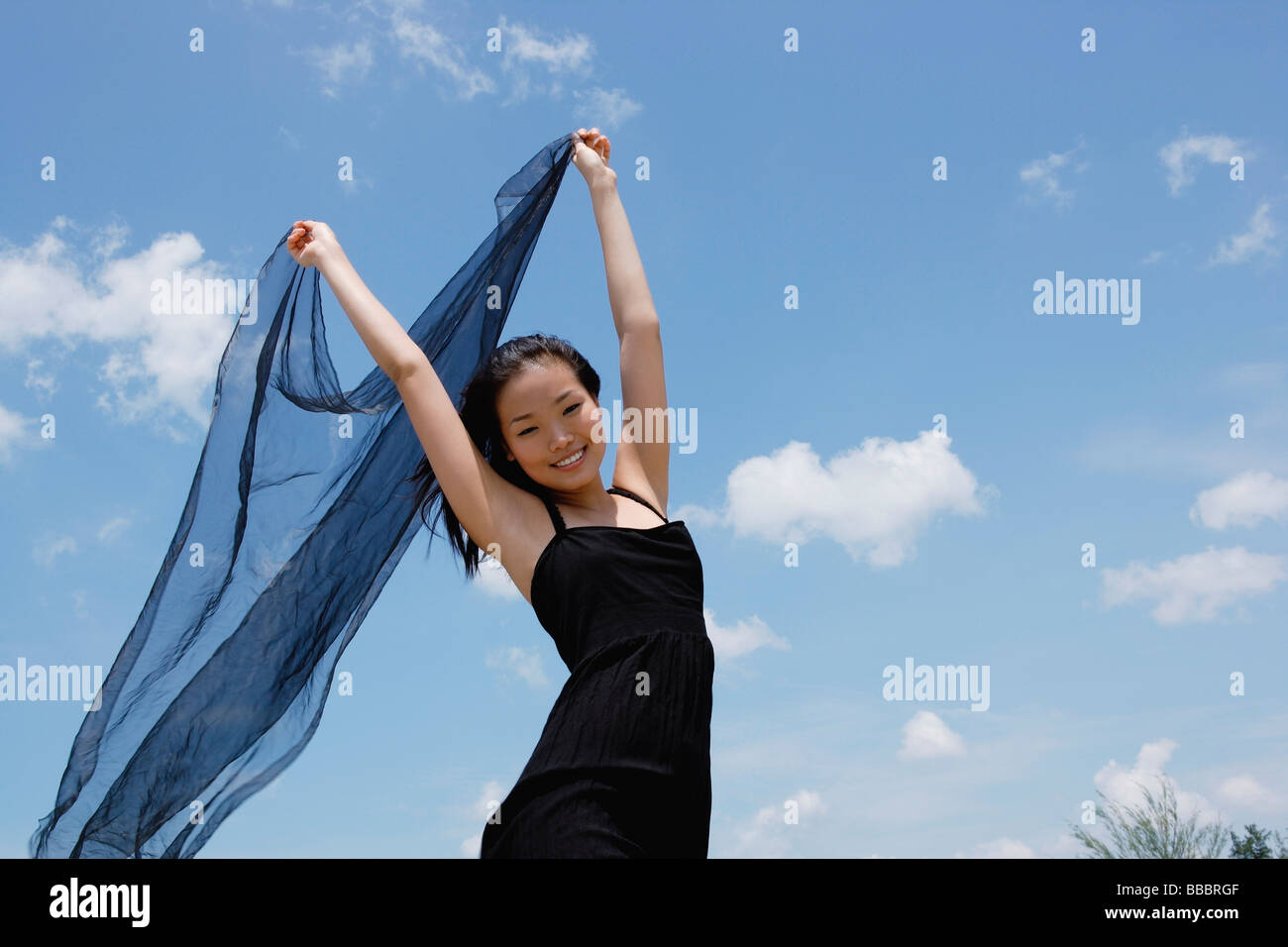 Woman windy day dress hi-res stock photography and images - Alamy