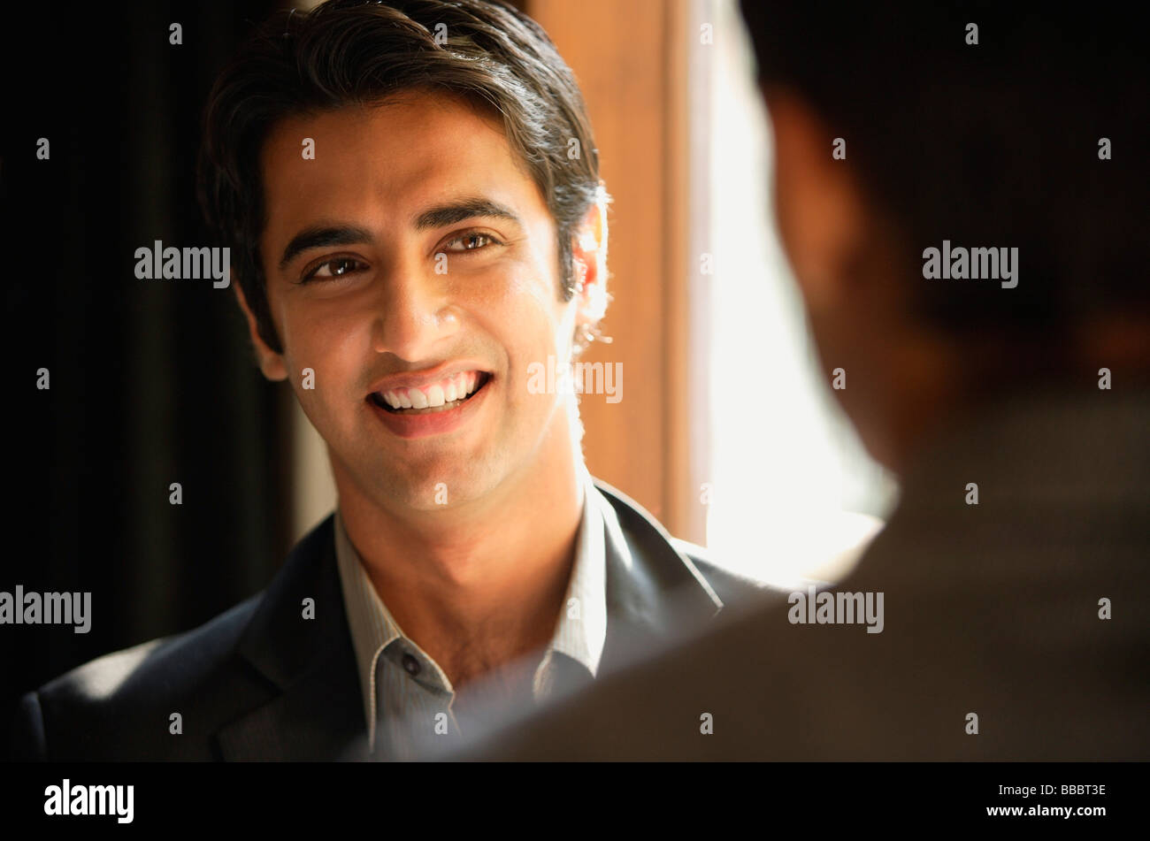 male colleagues talking (close-up, horizontal Stock Photo - Alamy