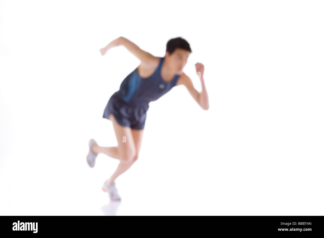 Young sports man running on Cut Out Stock Images & Pictures - Alamy