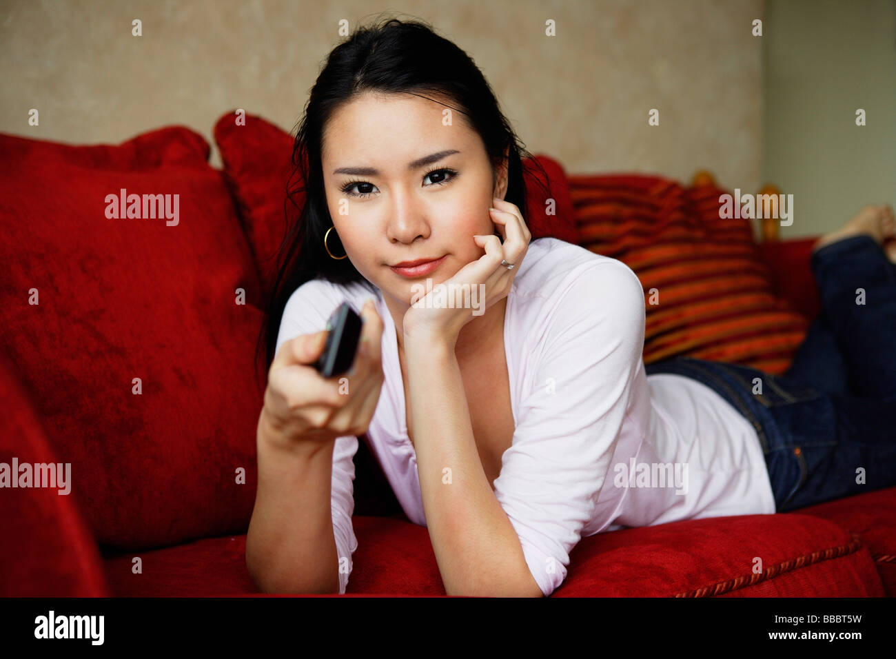 woman changing channels Stock Photo - Alamy