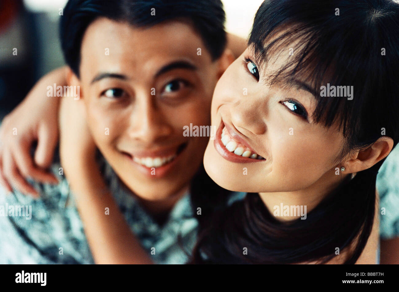 Woman embracing man, elevated view, portrait Stock Photo - Alamy