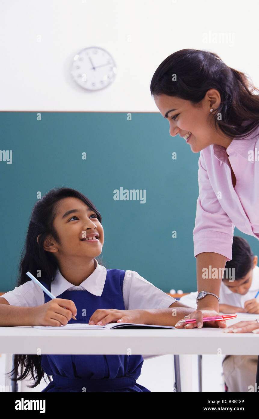 Teacher supervising students classroom hi-res stock photography and ...