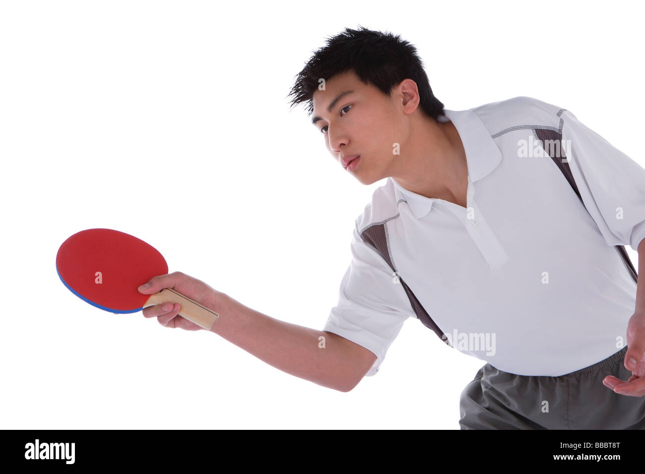 Young man playing table tennis Stock Photo - Alamy