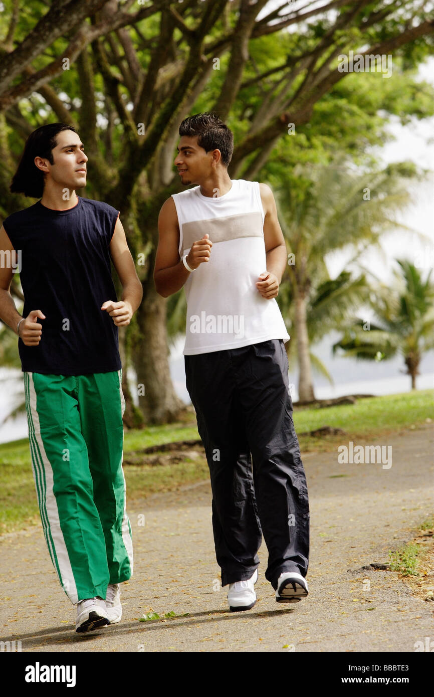 Indian men running in park hi-res stock photography and images - Alamy
