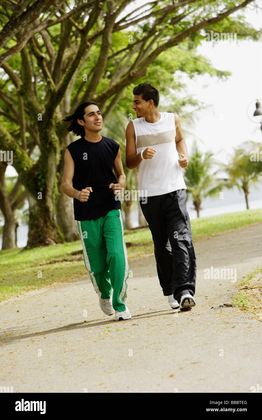 Indian men running in park hi-res stock photography and images - Alamy