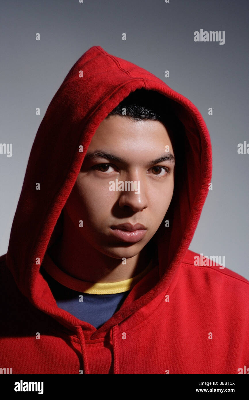 Man wearing red hooded shirt hi-res stock photography and images - Alamy
