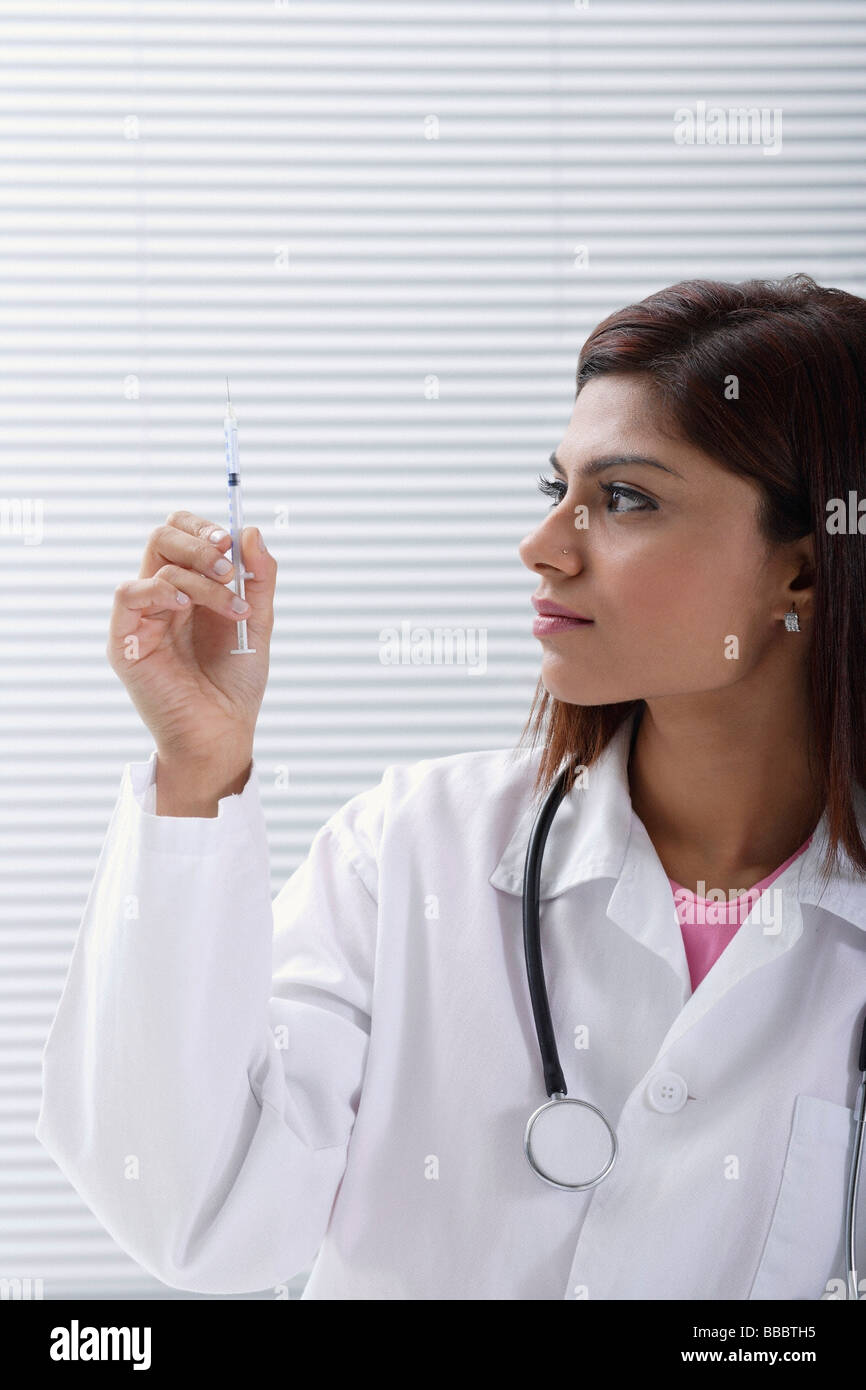 One indian doctor injection hi-res stock photography and images - Alamy