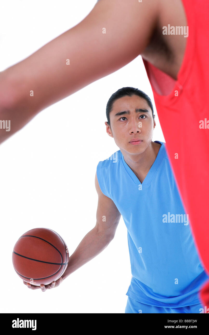 Two men playing basketball Stock Photo - Alamy