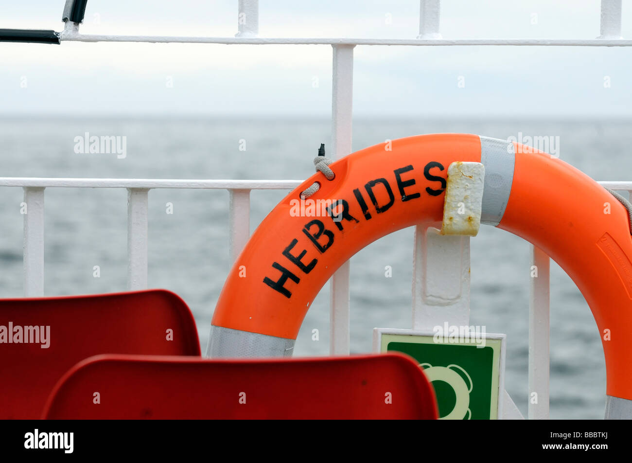 Life ring and guardrail on a ferry to the Western Isles in Scotland ...
