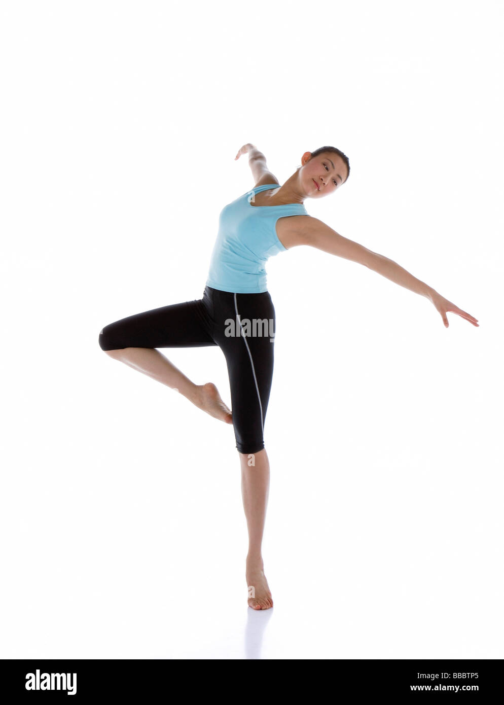 Female gymnast standing on one leg hi-res stock photography and images ...