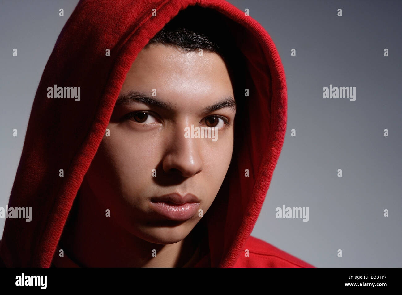 Man wearing red hooded shirt hi-res stock photography and images - Alamy