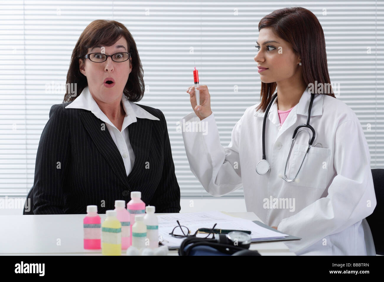 Frightened patient with doctor Stock Photo - Alamy