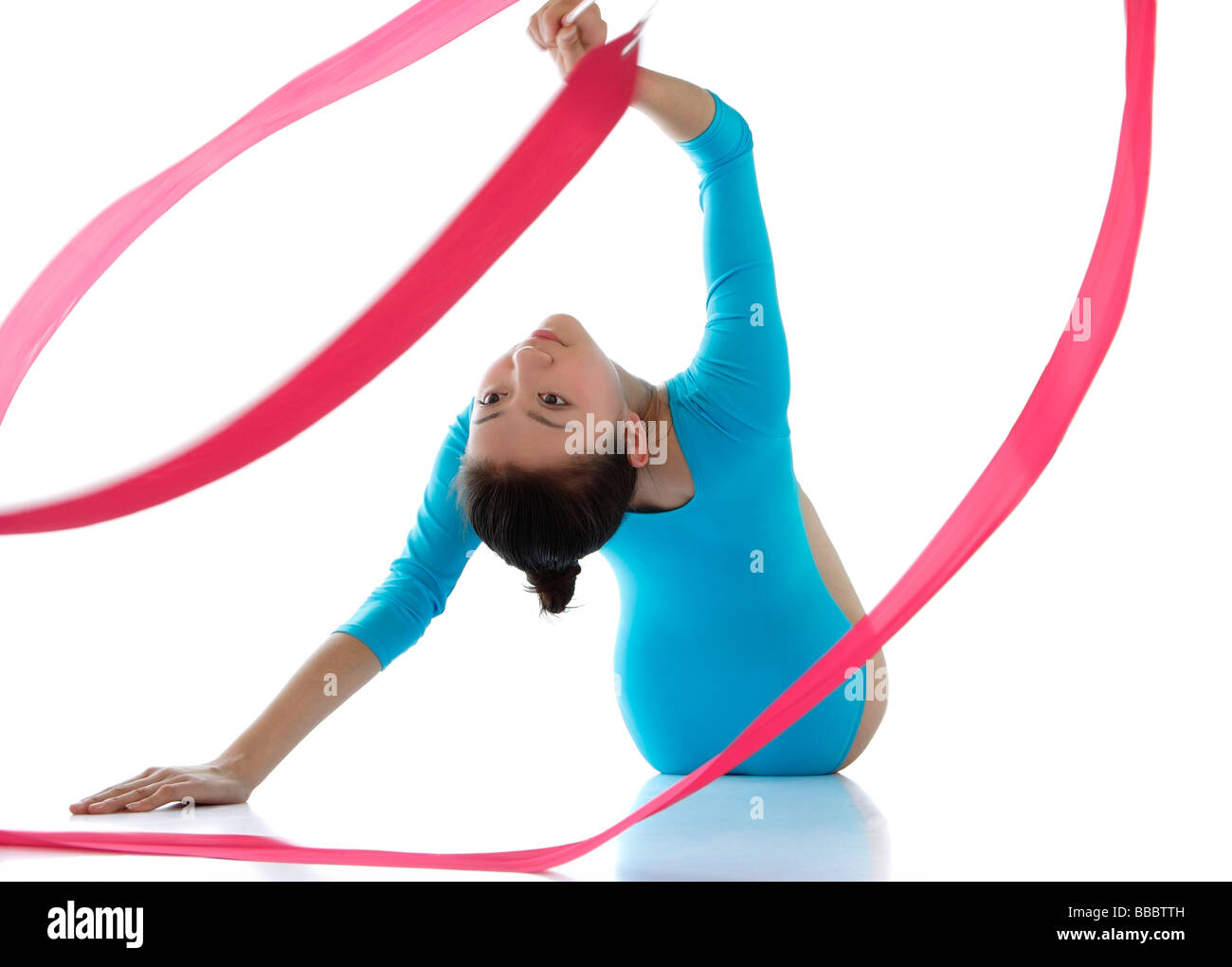 Rhythmic gymnastics, woman doing routine with ribbon Stock Photo - Alamy