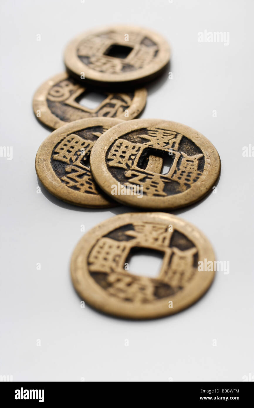 Chinese coin with hole hi-res stock photography and images - Alamy