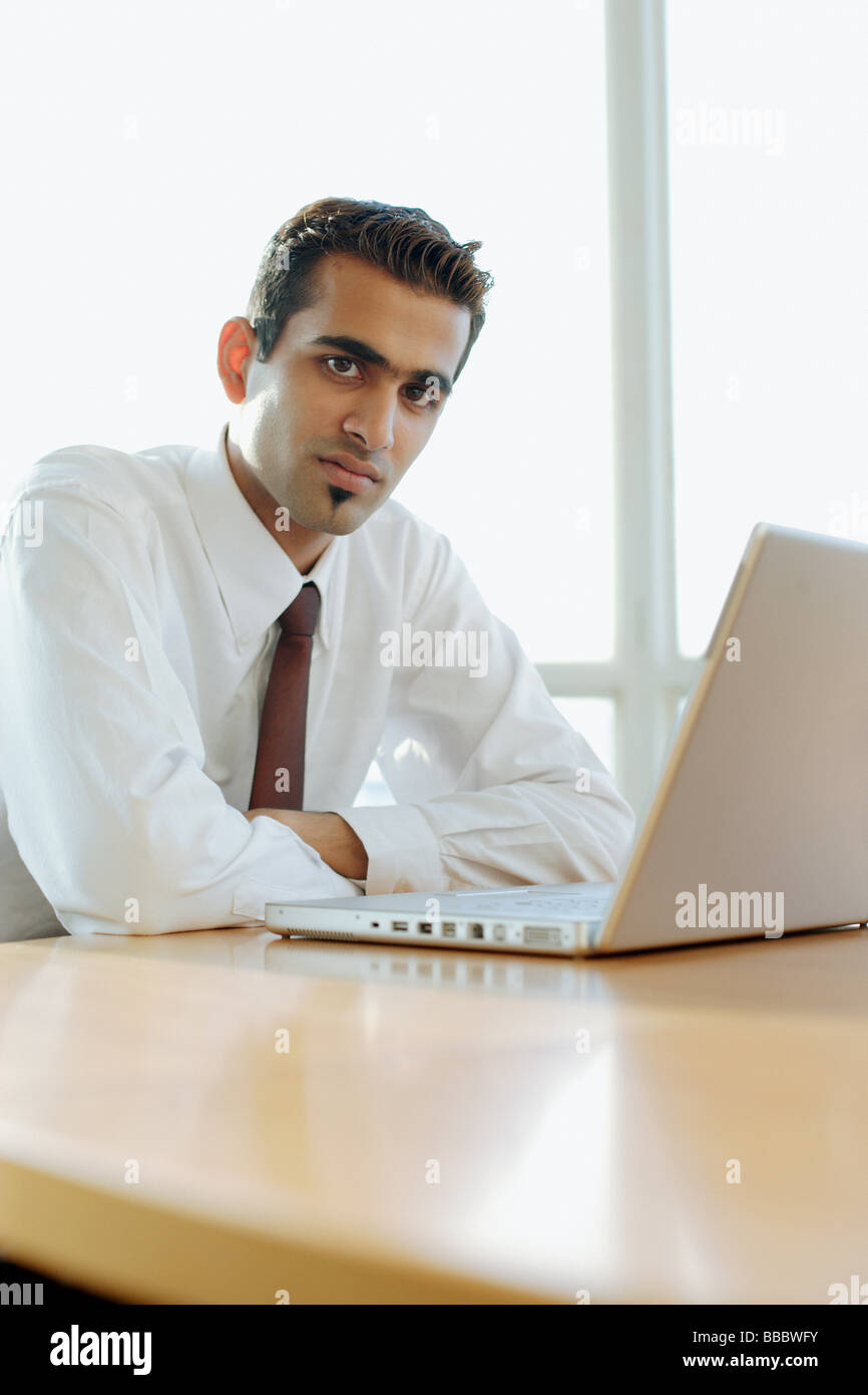 Male executive looking at camera, portrait Stock Photo - Alamy