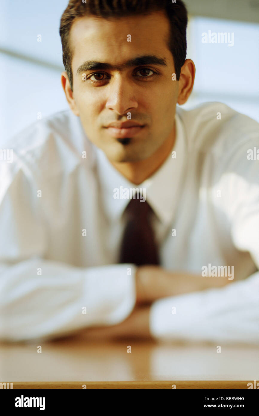 Male executive, looking at camera, portrait Stock Photo - Alamy