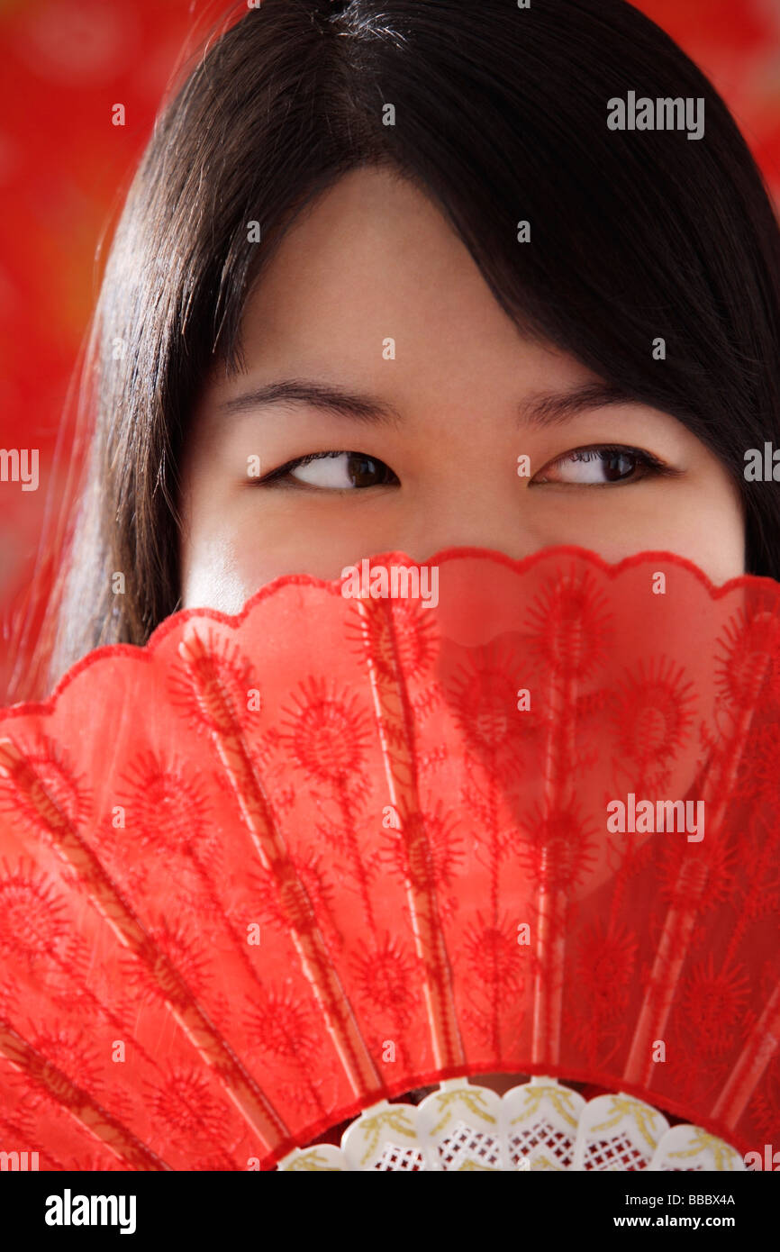 Hand held fan hi-res stock photography and images - Alamy