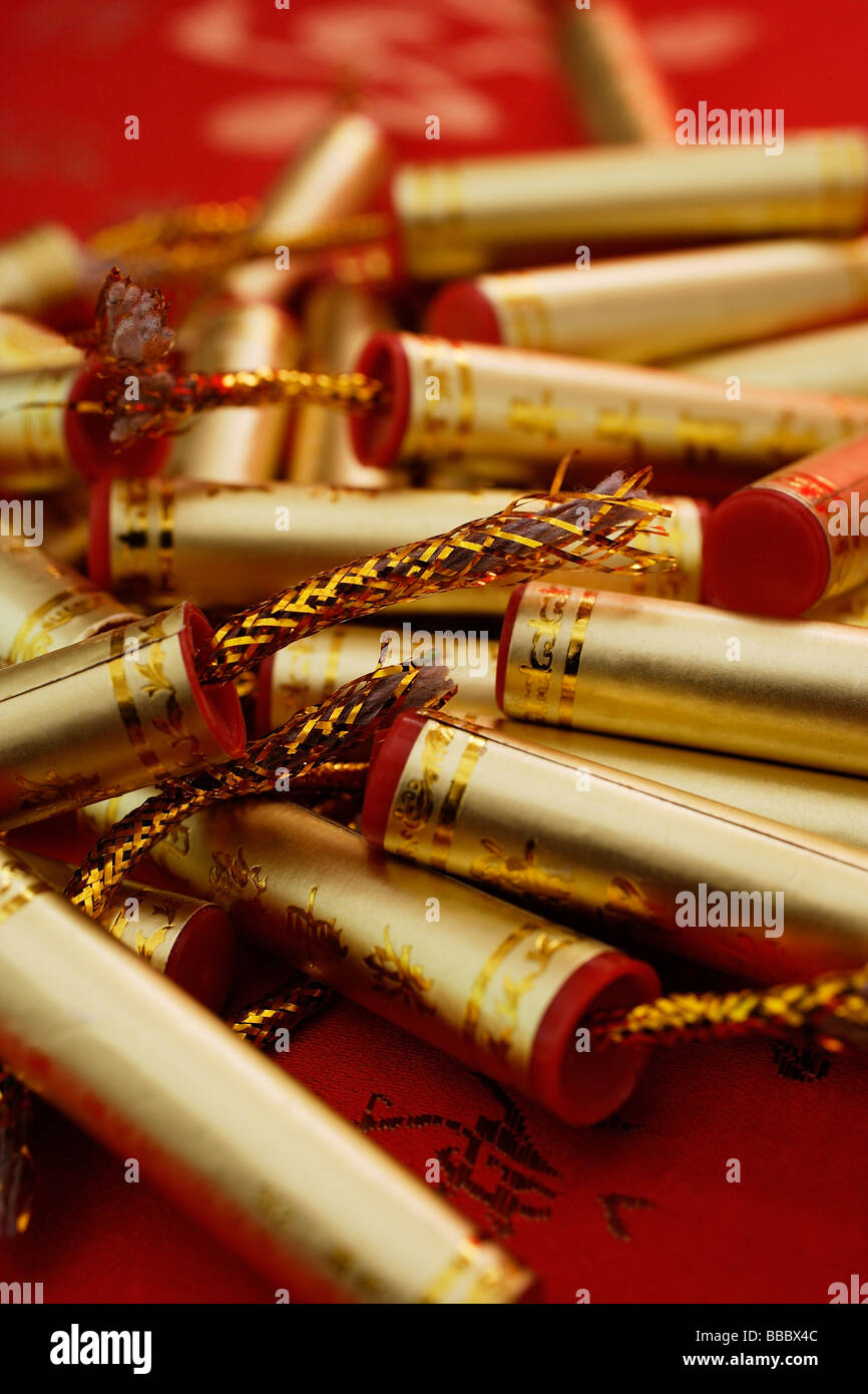 Still life of Chinese New Year decorations, fire-crackers Stock Photo ...