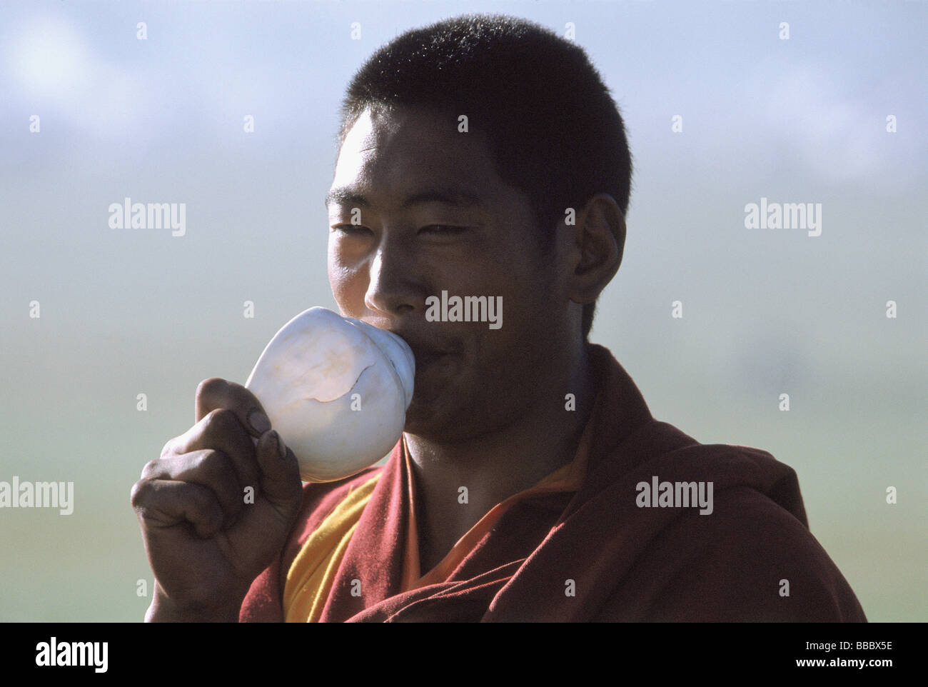 Blowing the conch shell hi-res stock photography and images - Alamy