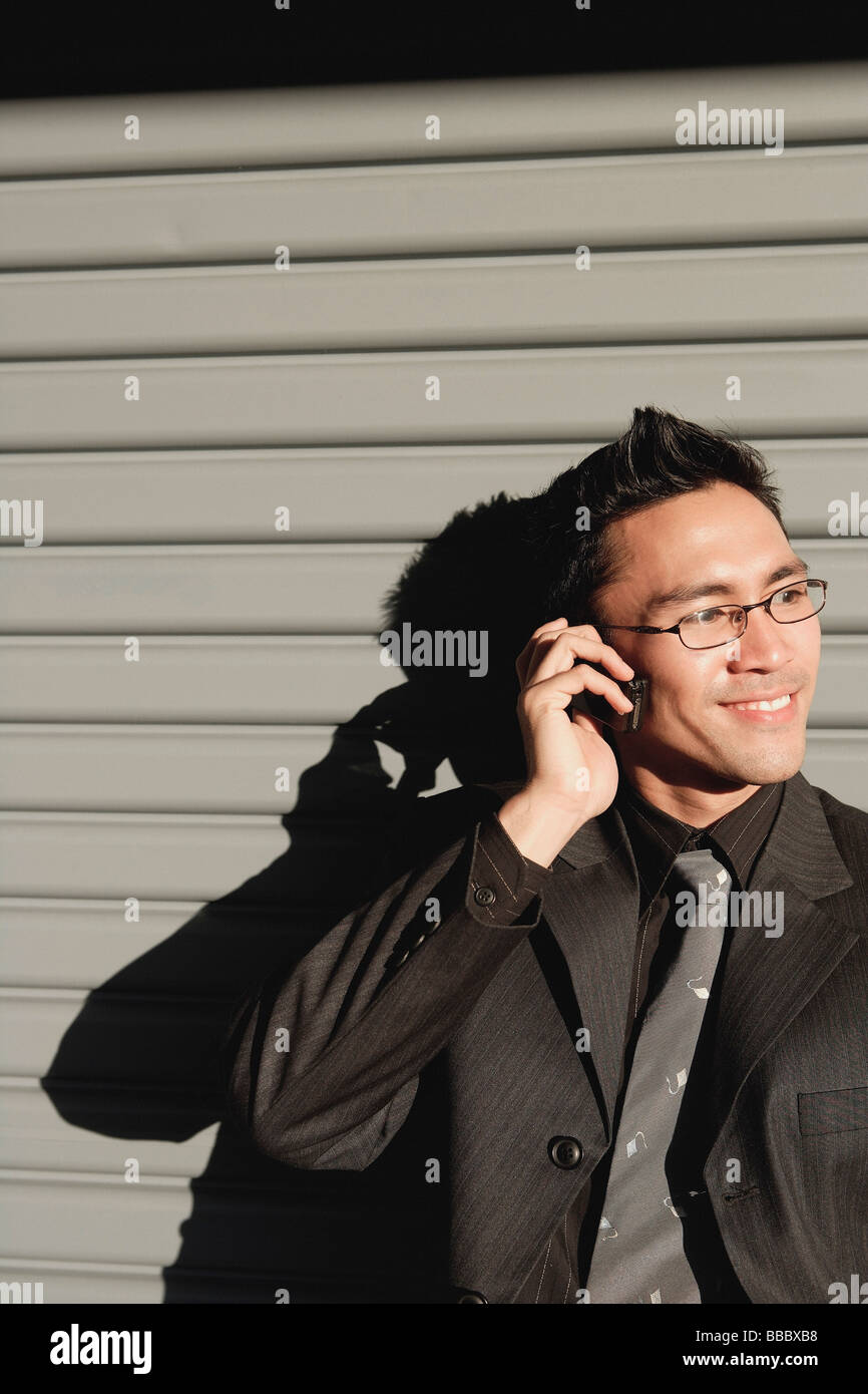 Man using mobile phone shadow hi-res stock photography and images - Alamy