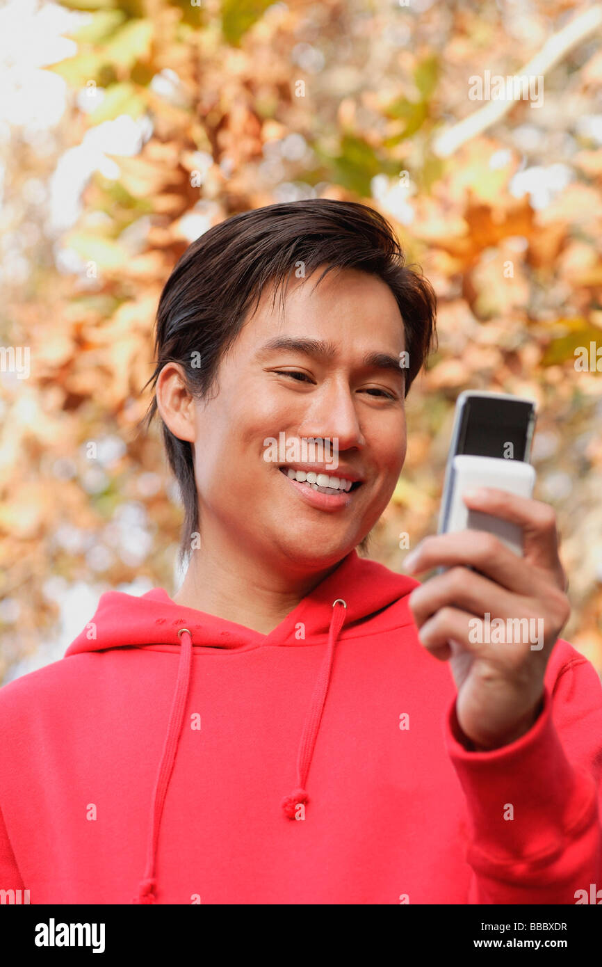 Man using mobile phone Stock Photo - Alamy