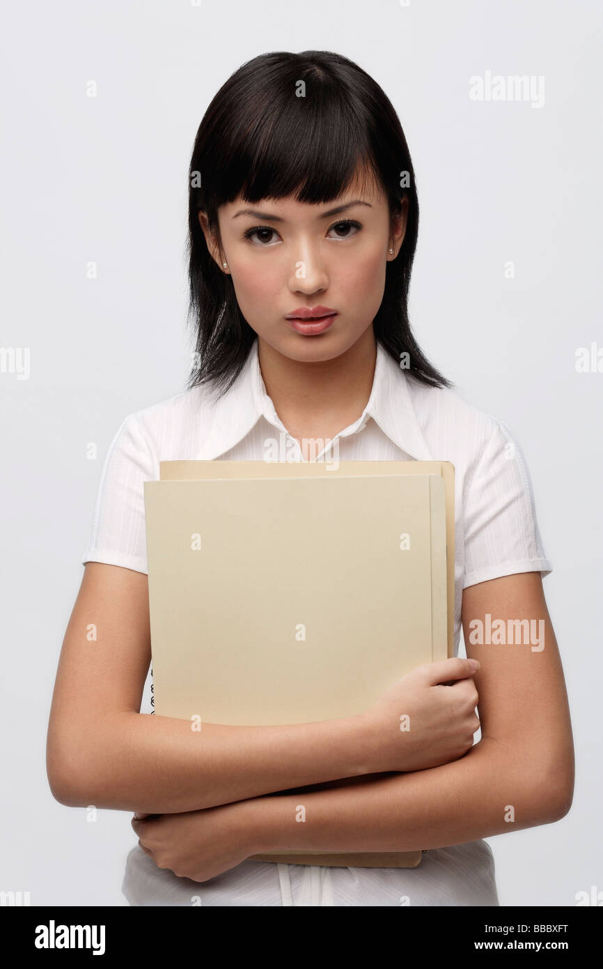 Secretary holding files Stock Photo - Alamy