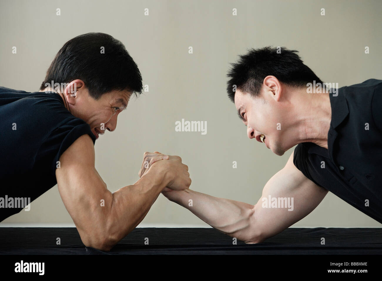 Two men arm wrestling hi-res stock photography and images - Alamy
